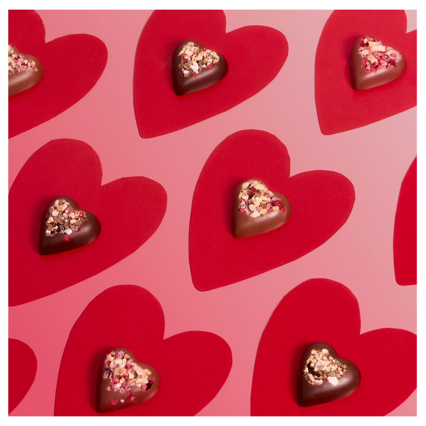 Small white heart-shaped box of Valentine's Day chocolates
