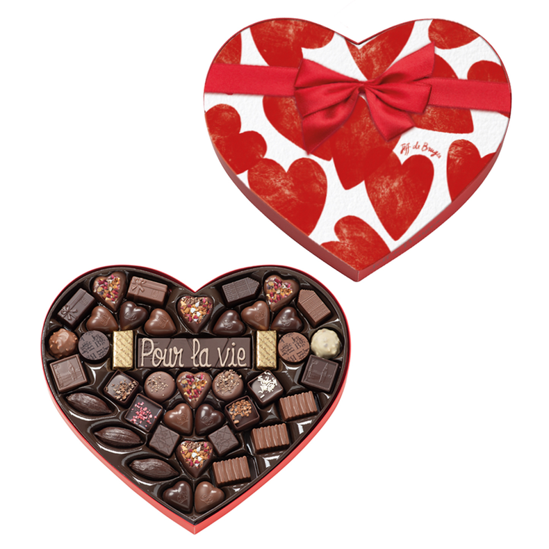 Large white heart-shaped of Valentine's Day chocolates box with dark ...